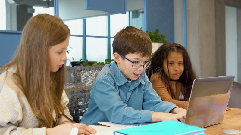 Group of Elementary Age Schoolchildren Learning To Read Stock Footage ...