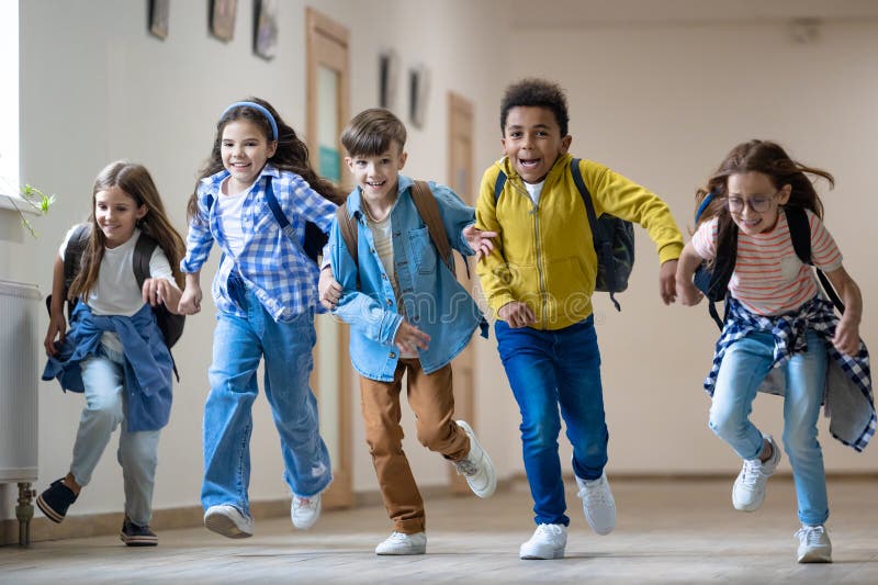 Group of Elementary School Kids Running in School Corridor. Stock Image ...