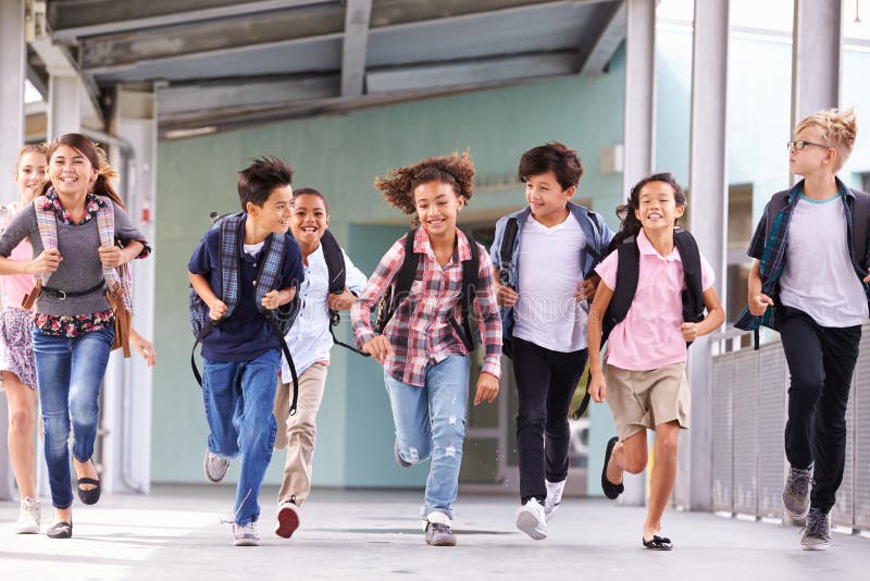 Group of Elementary School Kids Running in a School Corridor Stock ...