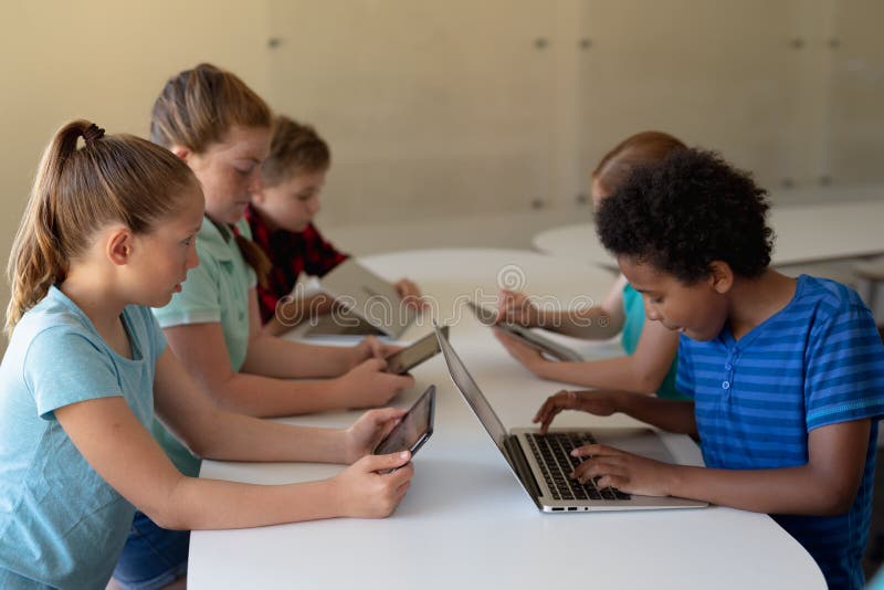 Group of Elementary School Kids Using Computers Stock Image - Image of ...