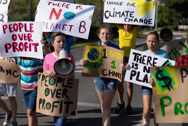 Group of Elementary School Pupils Walking on a Protest March Stock ...