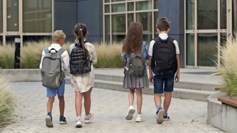 Group of Elementary School Students Rush To a Lesson To School. Back To ...