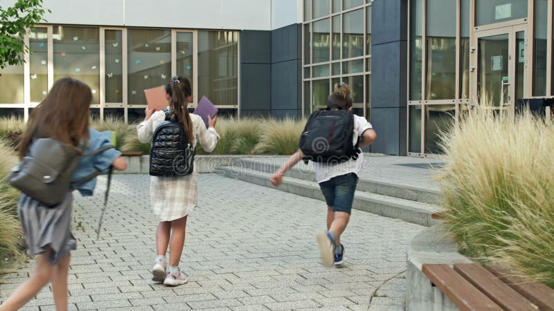 Group of Elementary School Students Rush To a Lesson To School. Back To ...