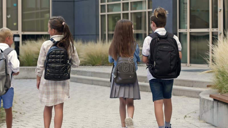 Group of Elementary School Students Rush To a Lesson To School. Back To ...