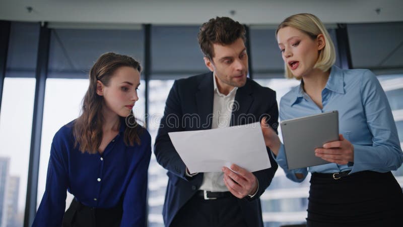 Group Employees Analyzing Documents Data Checking Tablet in Office ...