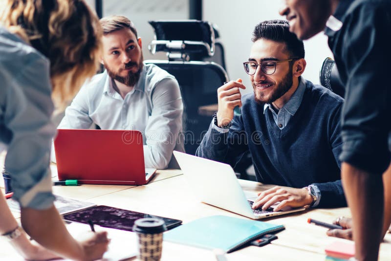 Group of Employees Discussing Ideas during Brainstorming Briefing and ...