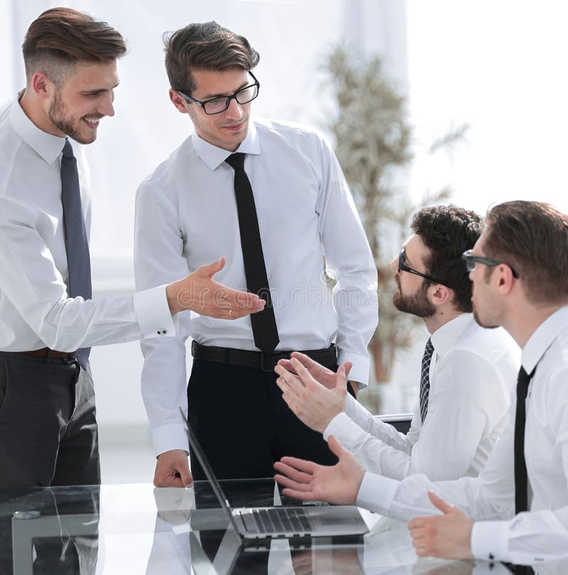Group of Employees Discussing Ideas for a New Project Stock Photo ...