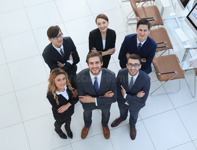.Employees Looking at Laptop and Talking about Work Stock Image - Image ...