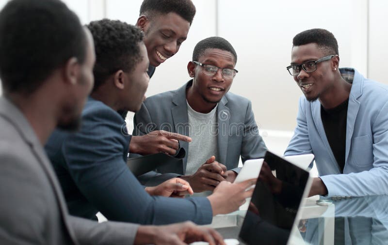 Group of Employees Looking at the Screen of a Digital Tablet. Stock ...