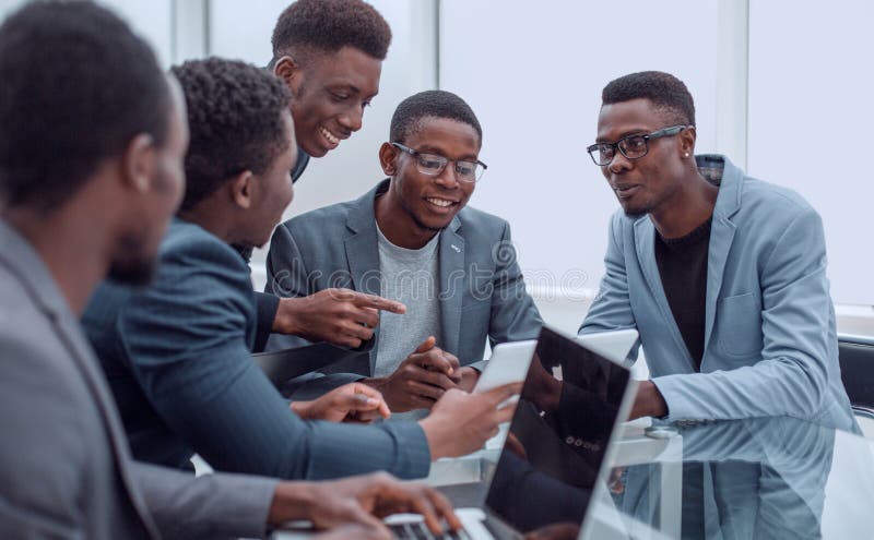 Group of Employees Looking at the Screen of a Digital Tablet. Stock ...