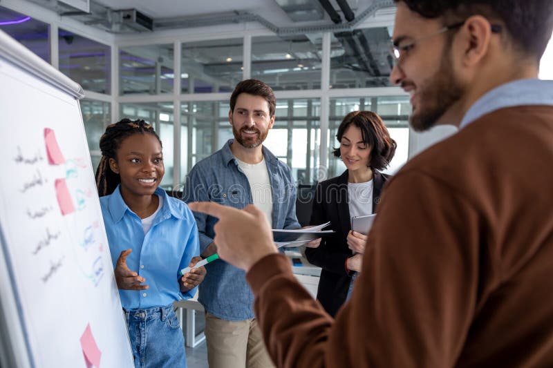 Group of Employees Training in Boardroom with Whiteboard and Project ...