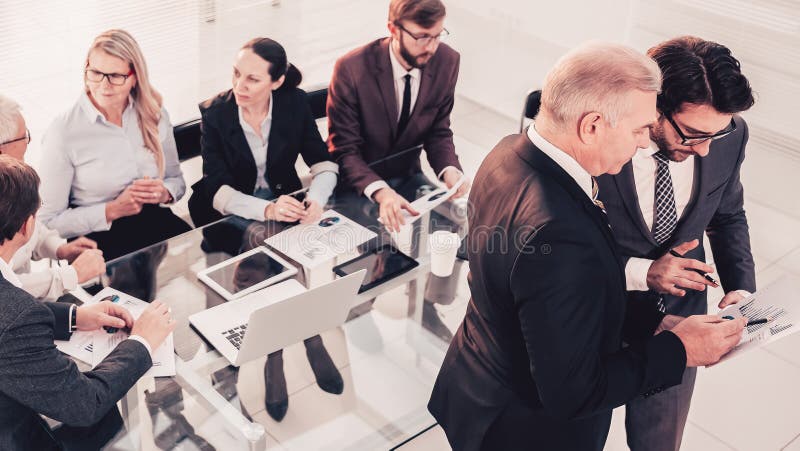 Group Employees Work with Business Documentation in the Office . Stock ...