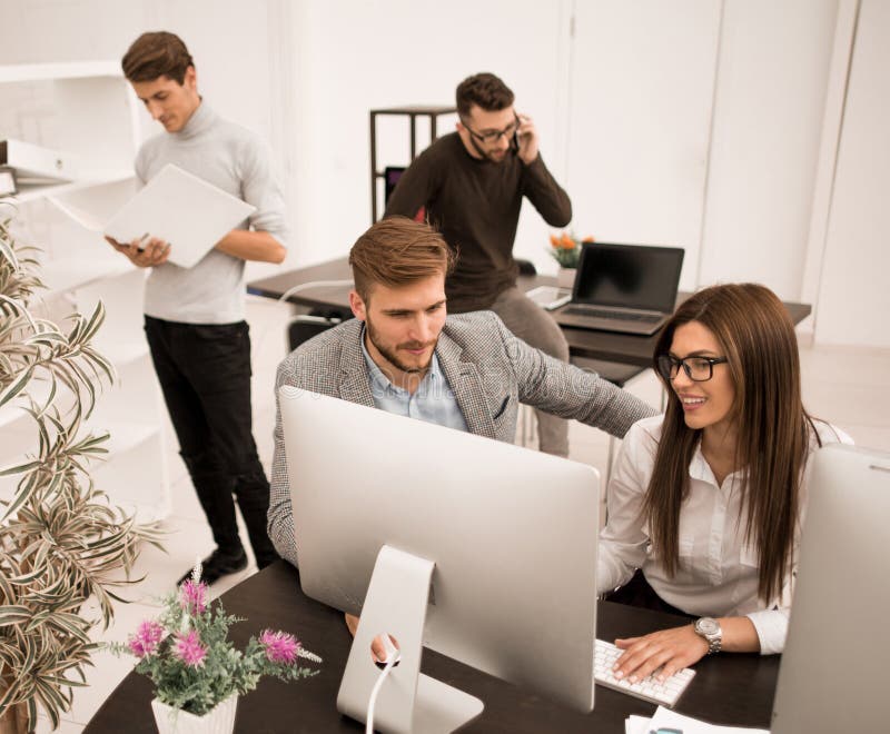 Group of Employees Works in a Modern Office. Stock Image - Image of ...