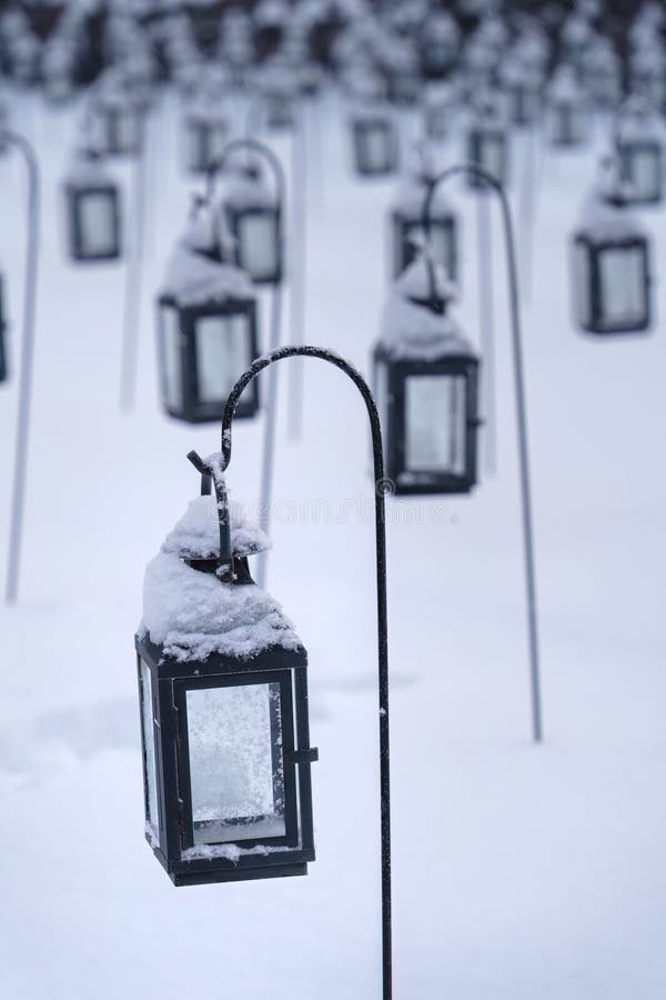 Group of Empty Lanterns in a Cemetery in Winter Stock Image - Image of ...