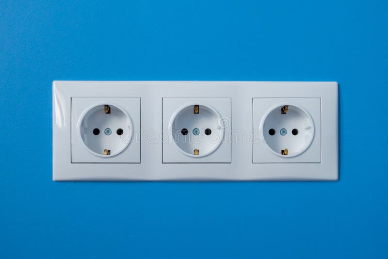 Empty, Unplugged European Wall Outlet Close Up on Red Background. White ...