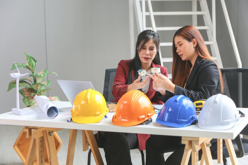 Group of Engineer and Architecture Working Together at Project Site ...