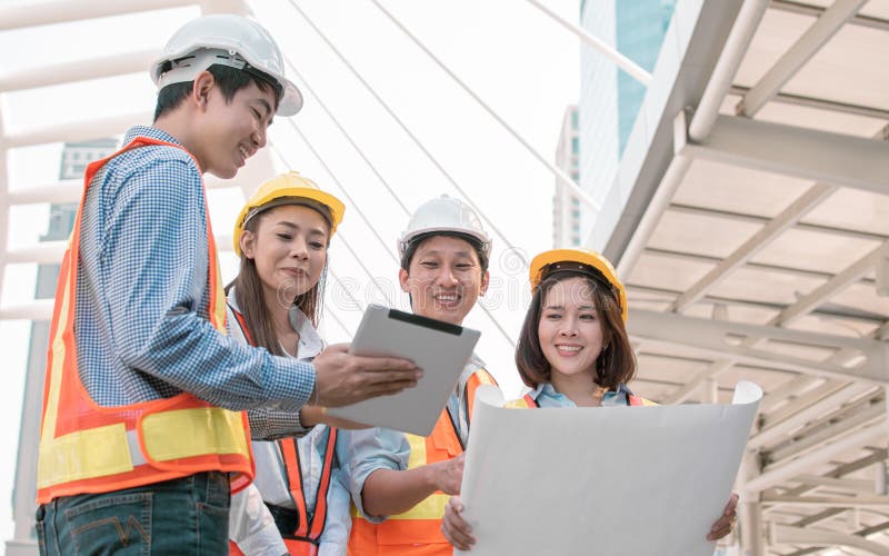 Group of Engineer Asian People Meeting and Working Communicating while ...