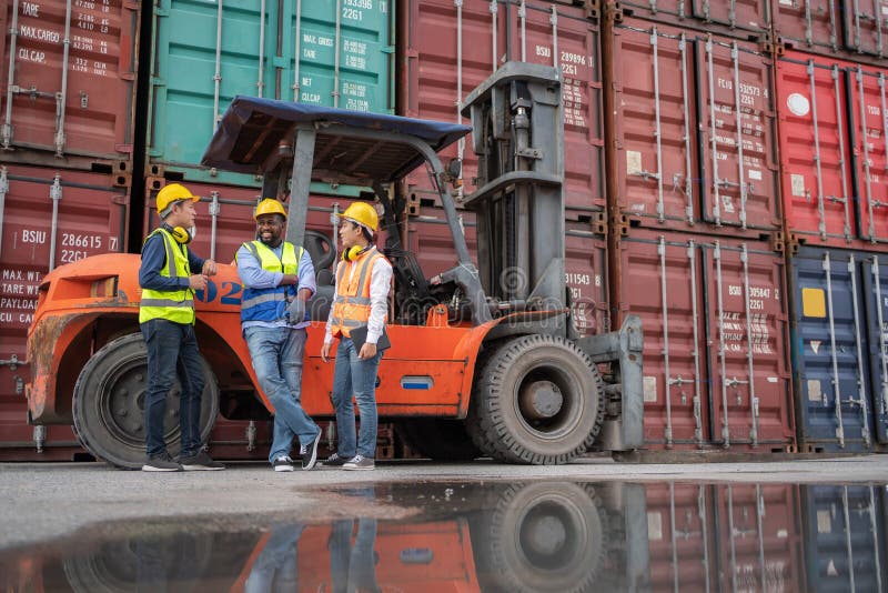 Group of Engineer Worker Standing in Front of Forklift in the Shipping ...