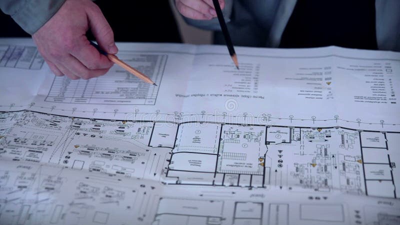 Group Engineers and Architects Discuss the Blueprint. Stock Footage ... Group Engineers and Architects Discuss the Blueprint. Stock Footage ...