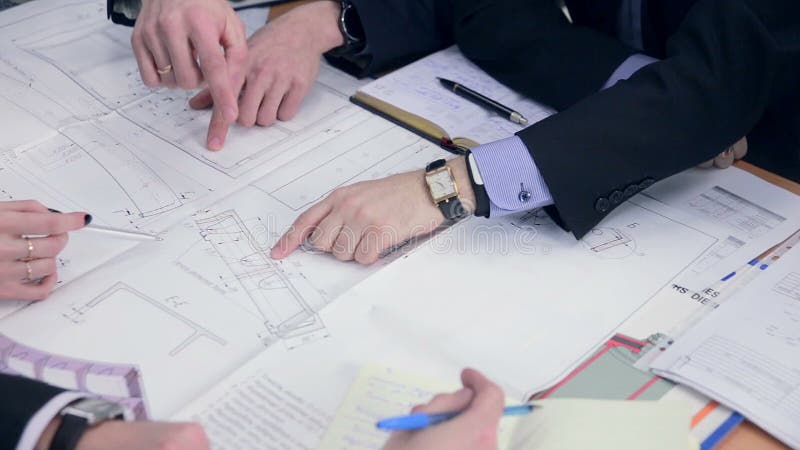 Group Engineers and Architects Discuss the Blueprint. Stock Footage ... Group Engineers and Architects Discuss the Blueprint. Stock Footage ...