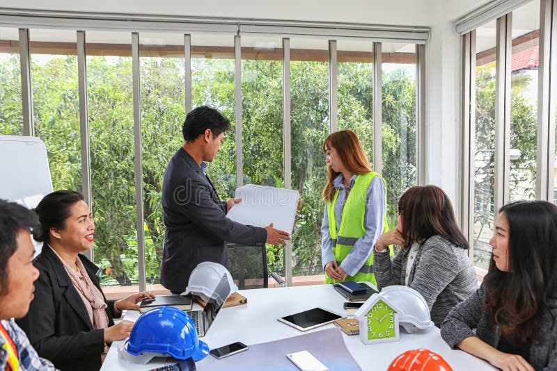 Group Engineers Discussing Work in Meeting Room at the Office Stock ...