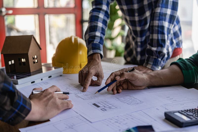 Group of Engineers and Working Meeting and Discussing Construction ...