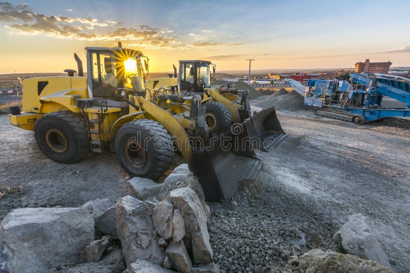 Group of Excavators at a Construction Site Stock Image - Image of ...