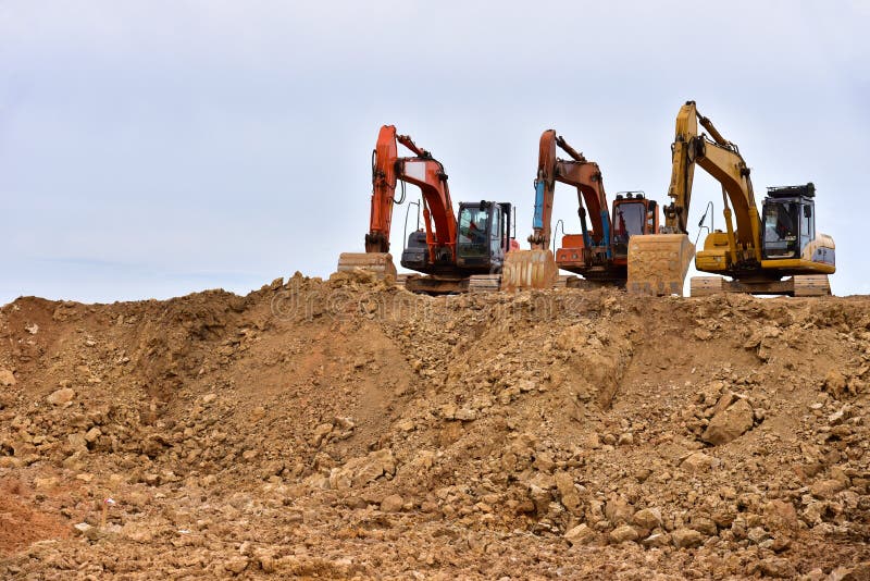 Group of the Excavators for Digging Ground, Trenching and Foundation at ...