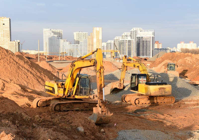 Group of the Excavators Working on Dig Ground Trenching at Construction ...