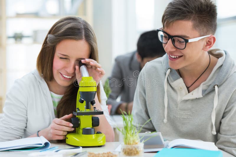 Group of Excited Students Working in Classroom Stock Image - Image of ...