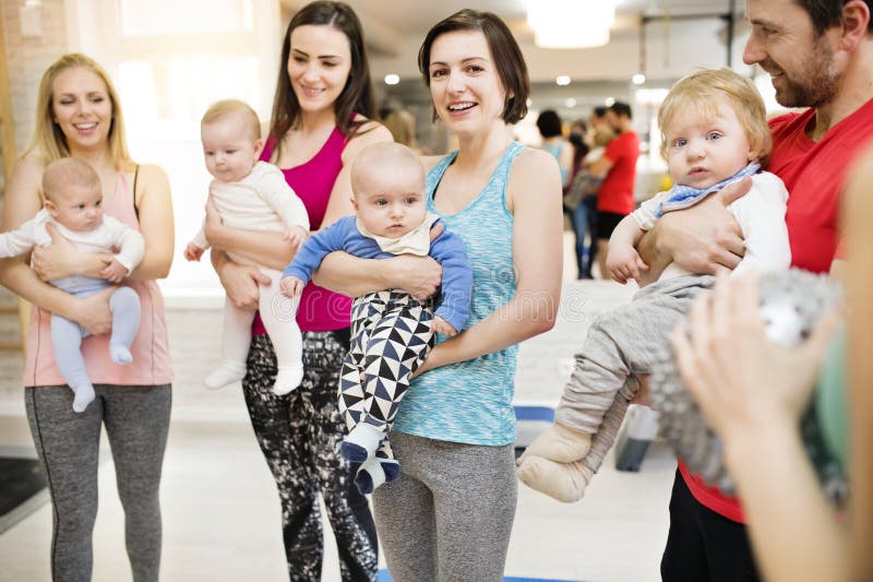 Group Exercise Class, Mother Working Out with Baby in Gym. Moms Staying ...