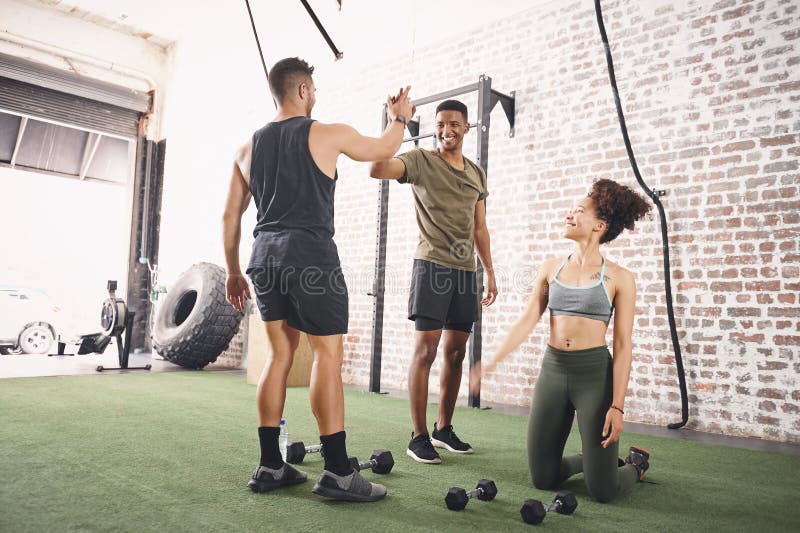 Group Exercise Classes are Motivational. Three Sporty Young People ...