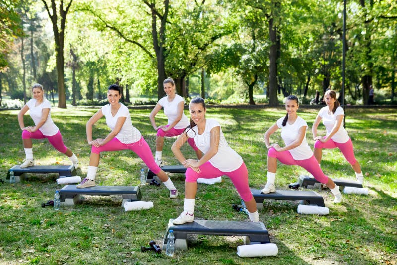 Women Doing Fitness Exercise on a Beach Stock Photo - Image of group ...