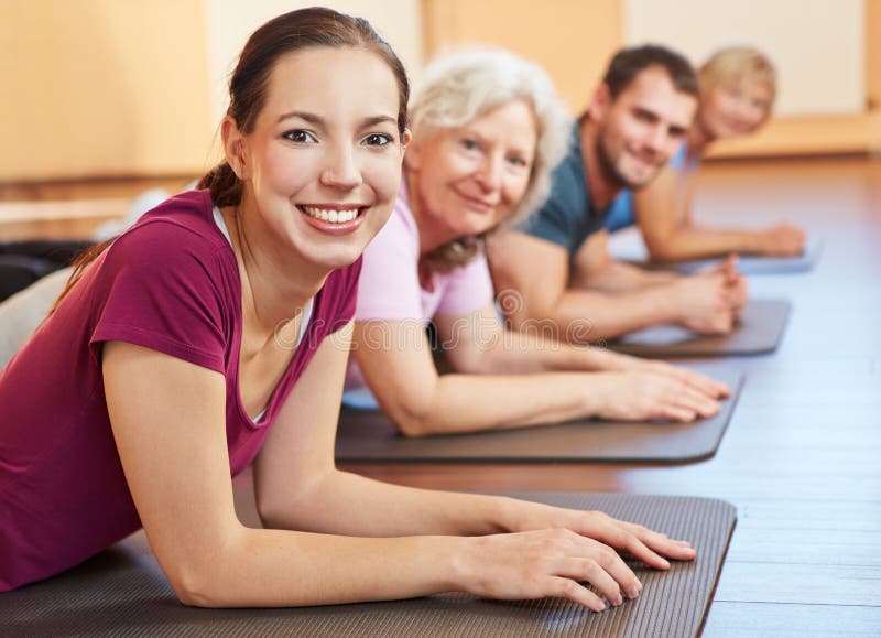 Group exercising in gym stock image. Image of body, exercise - 27675343