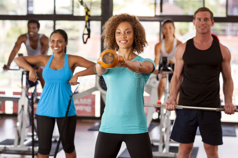 Group exercising in a gym stock photo. Image of woman - 47109370