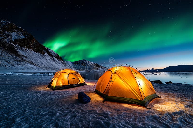 A Group of Explorers Setting Up Camp Under the Northern Lights, with ...