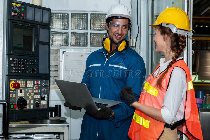 Group of Factory Workers Using Machine Equipment in Factory Workshop ...