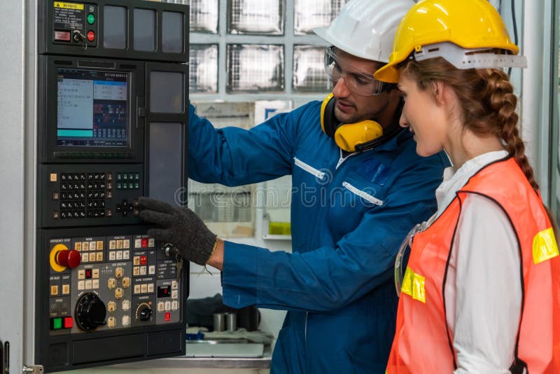 Group of Factory Job Workers Using Machine Equipment in Manufacturing ...
