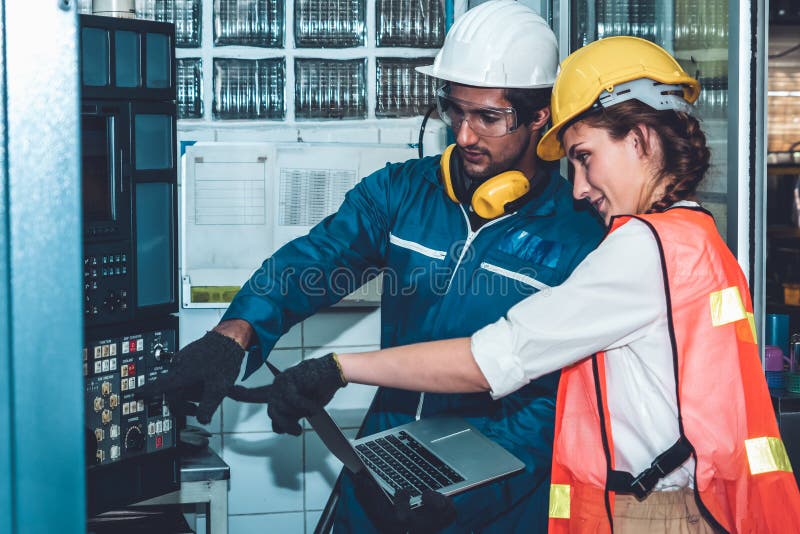 Group of Factory Job Workers Using Machine Equipment in Manufacturing ...