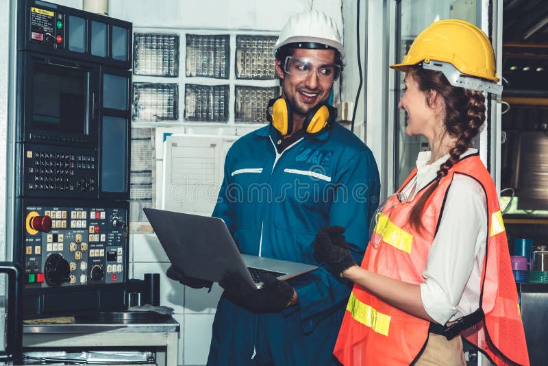 Group of Factory Job Workers Using Machine Equipment in Manufacturing ...