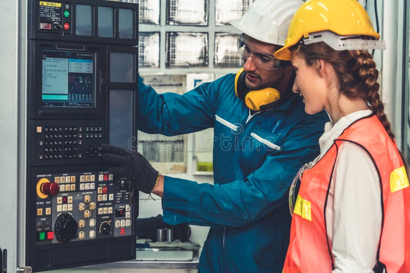 Group of Factory Job Workers Using Machine Equipment in Manufacturing ...