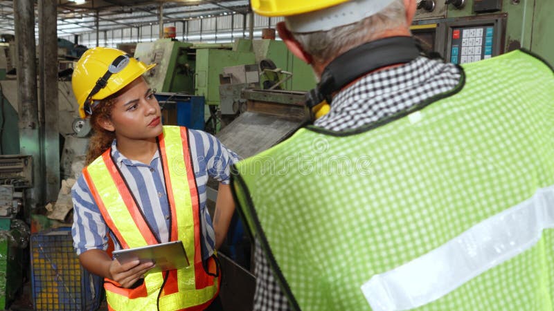 Group of Factory Workers Using Machine Equipment in Factory Workshop ...