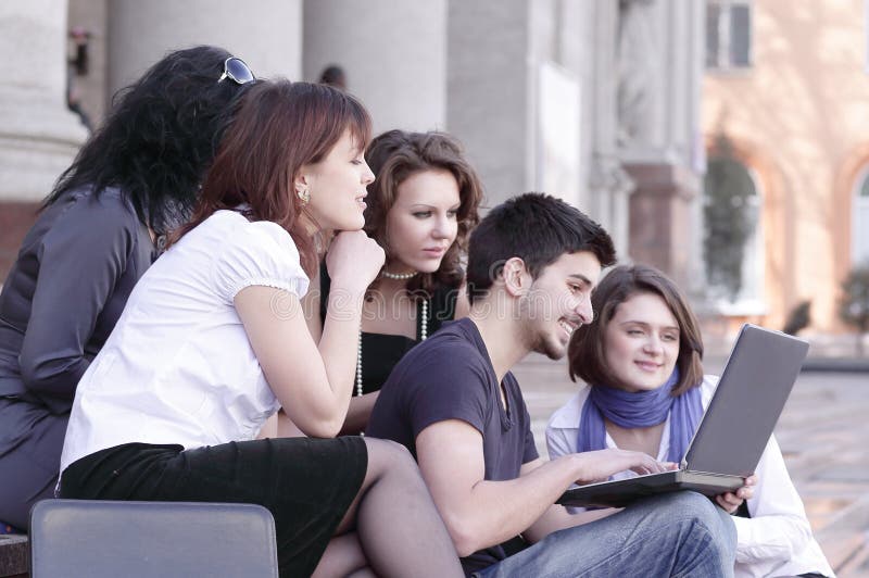 Group of Fellow Students with Books and Laptop Stock Image - Image of ...