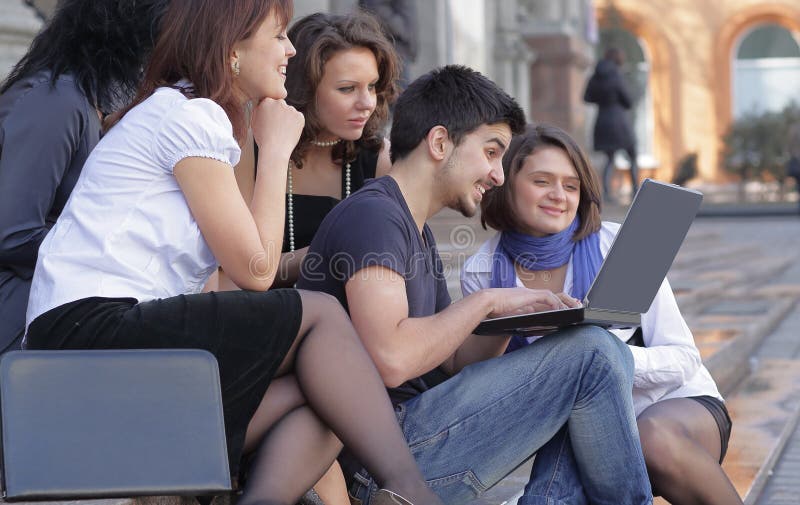 Group of Fellow Students with Books and Laptop Stock Image - Image of ...