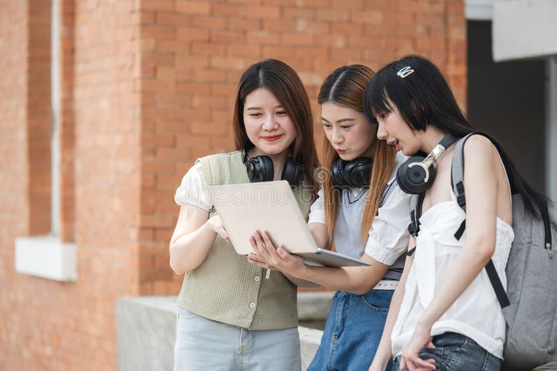 A Group of Female Female Students at an Asian University Stood Outside ...