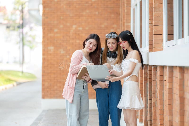 A Group of Female Female Students at an Asian University Stood Outside ...