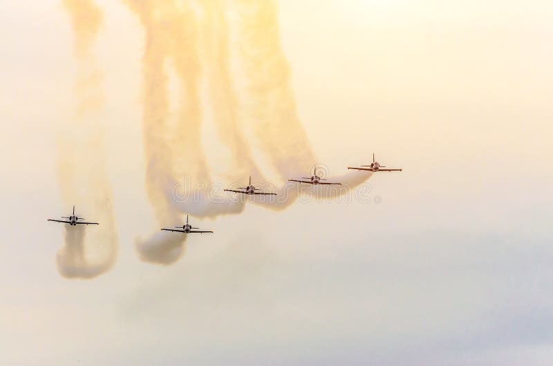 Group of Fighter Jet Airplane with a Trace of White Smoke Against a ...