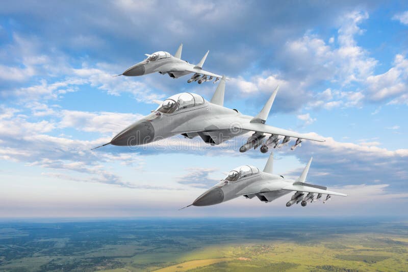 A Group of Fighter Jets Flies Over Territories Stock Photo - Image of ...