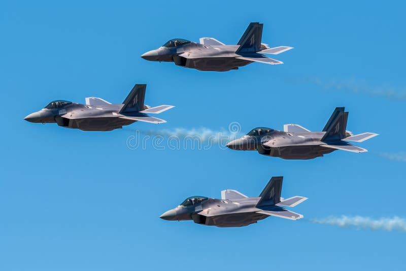 A Group of Fighter Jets Flying through a Blue Sky Stock Illustration ...