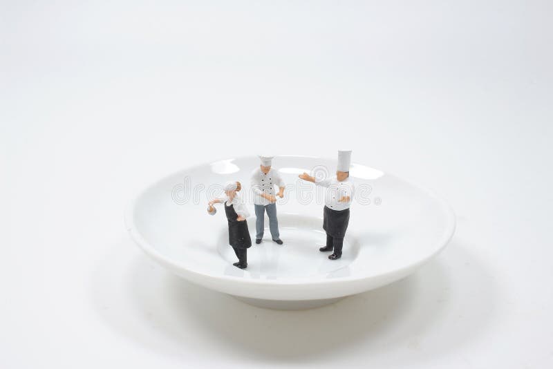 A Group of Figures of Chefs on Saucer Stock Photo - Image of people ...